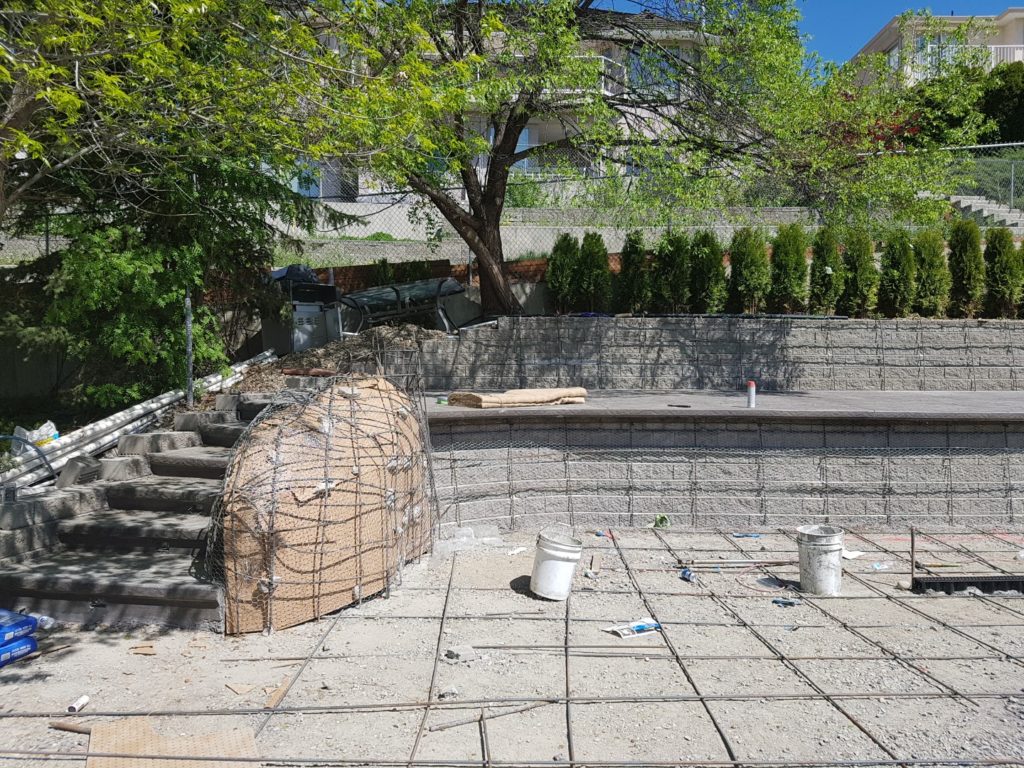 Concrete faux rocks | Kelowna Concrete, Finishing, Repairs, Stamped ...